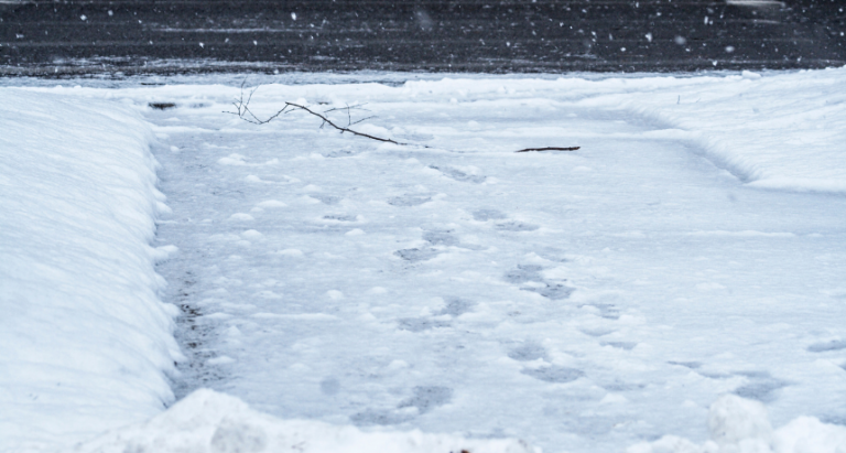 How to Remove Ice and Snow from a Paver Driveway Without SaltPavestone ...